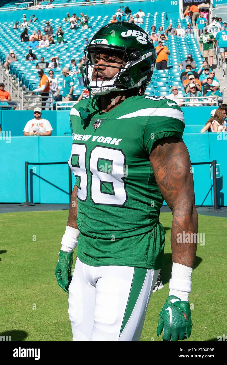 New York Jets defensive lineman Bruce Hector (98) walks onto the field ...