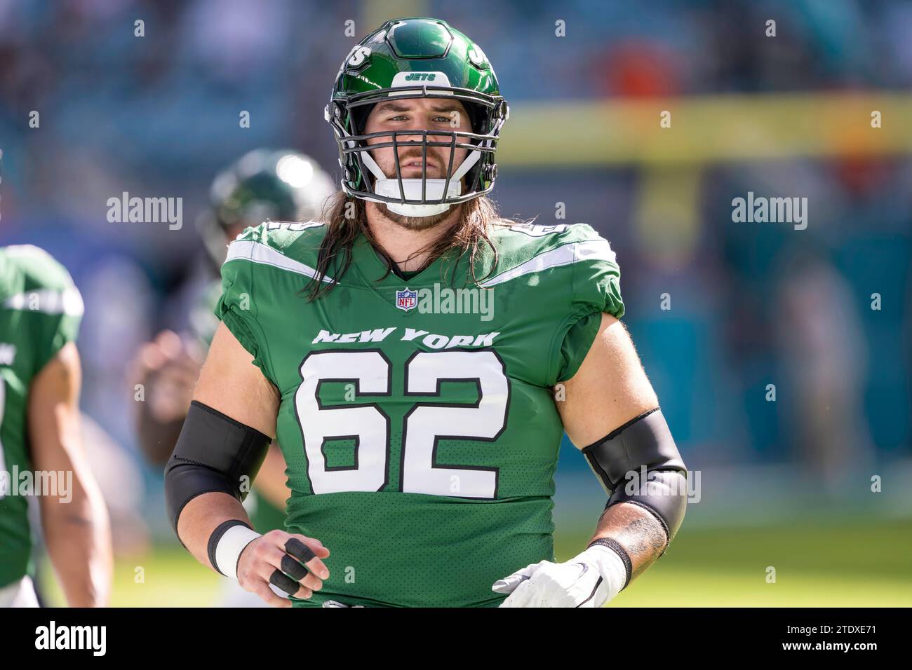 New York Jets offensive lineman Jacob Hanson (62) walks on the field ...