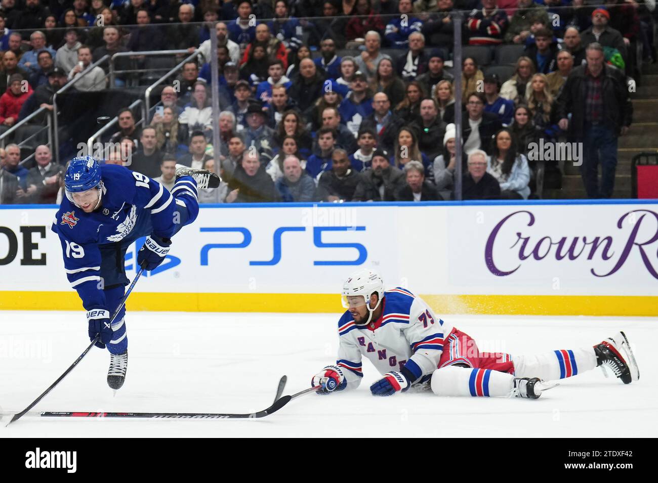 Toronto Maple Leafs forward Calle Jarnkrok (19) trips as New York ...