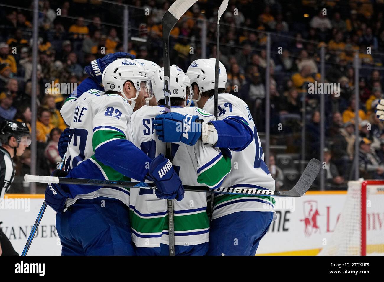 Vancouver Canucks players celebrate a goal during the first period of ...