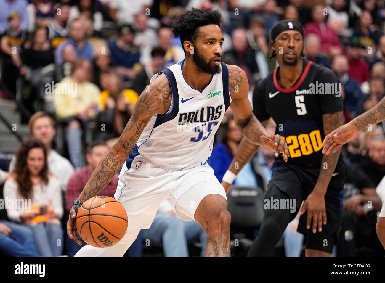 Dallas Mavericks forward Derrick Jones Jr. drive to the basket against ...