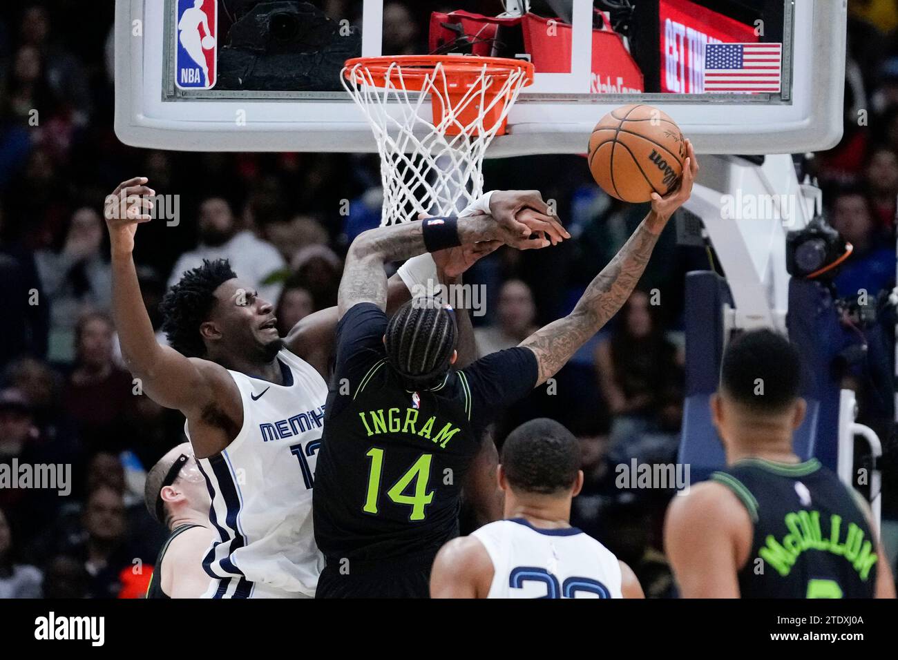 New Orleans Pelicans forward Brandon Ingram (14) is fouled by Memphis ...