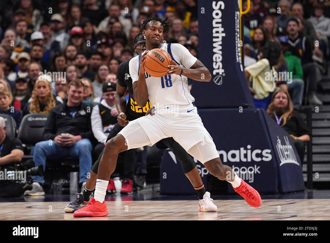 Dallas Mavericks forward Olivier-Maxence Prosper (18)spins against ...