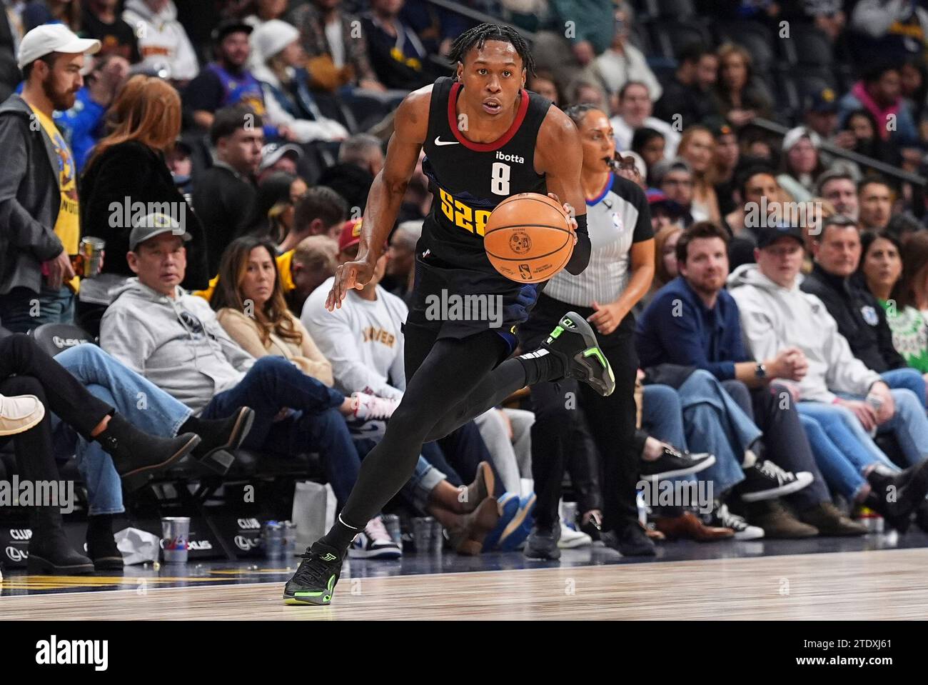 Denver Nuggets forward Peyton Watson brings the ball up court against ...