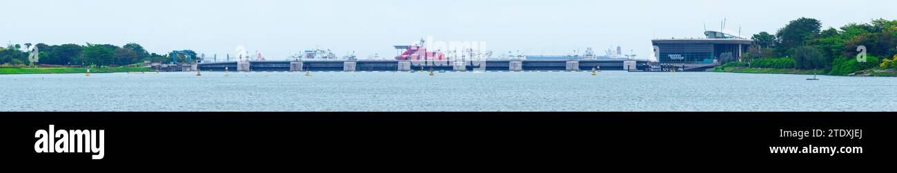A panorama of Marina Bay in Singapore at the Marina Barrage and Bridge ...