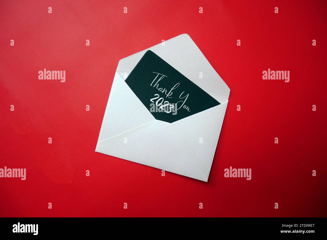 Thank you 2023 card in a white envelope with color background. bye-bye ...