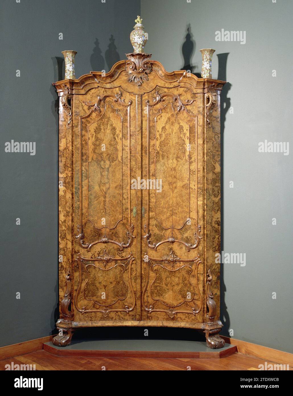 Corner cupboard with two doors, glued with carrot nut wood with a ...