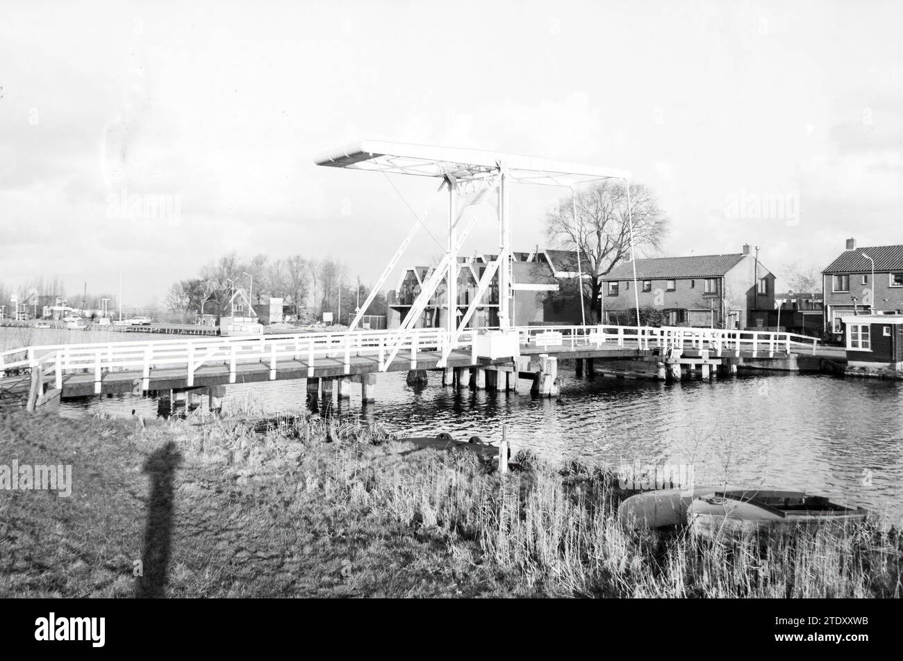 Drawbridge Vijfhuizerbrug over the Ringvaart with behind it the houses ...