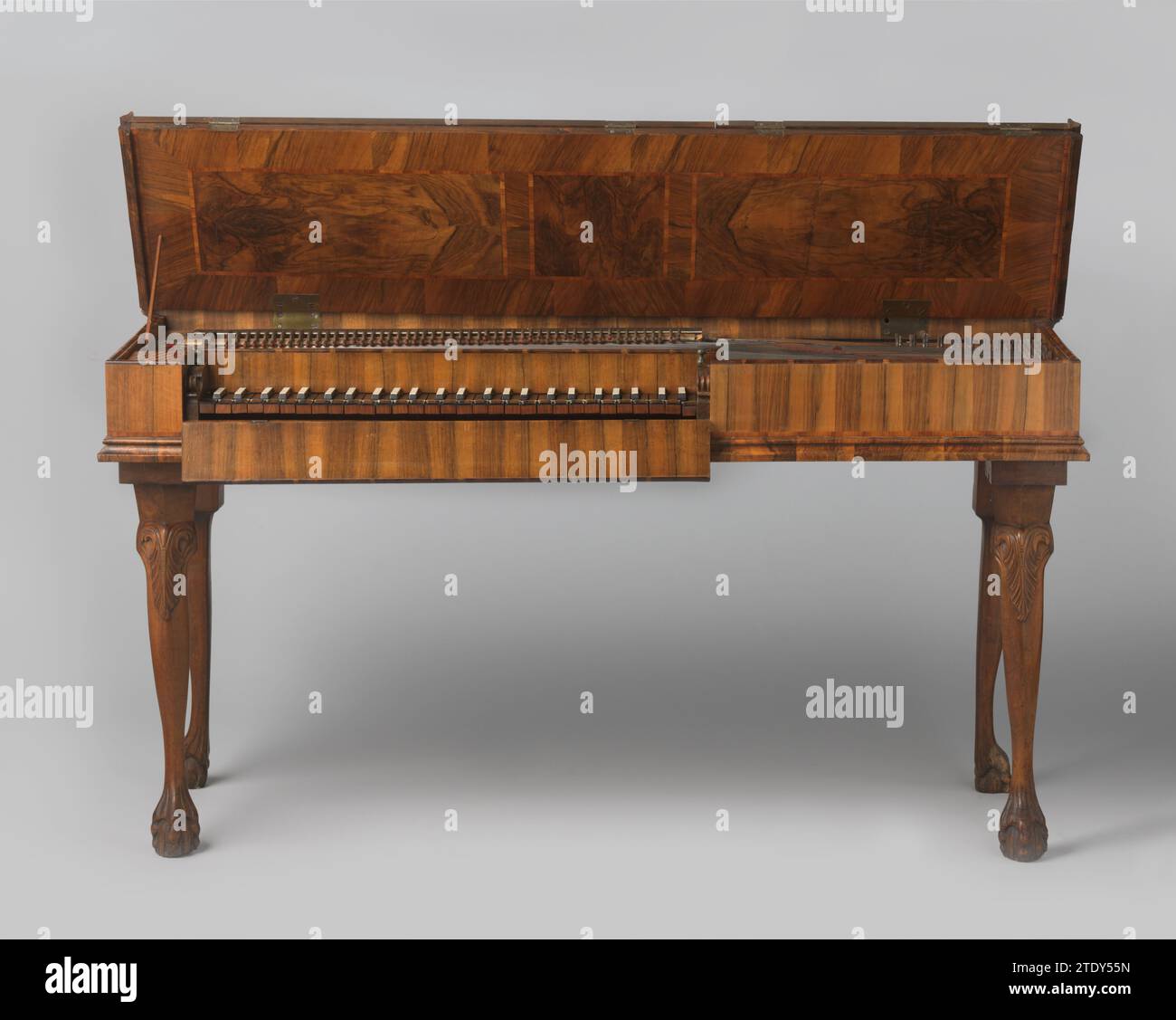 Square piano, anonymous, c. 1780 Table piano on four legs that end in ...