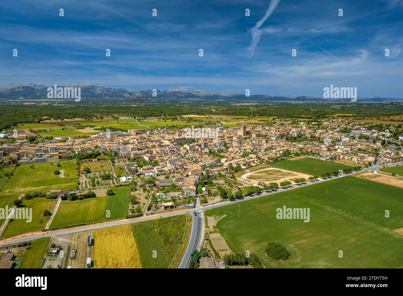 Aerial view of the town of Sineu and fields and rural surroundings in ...