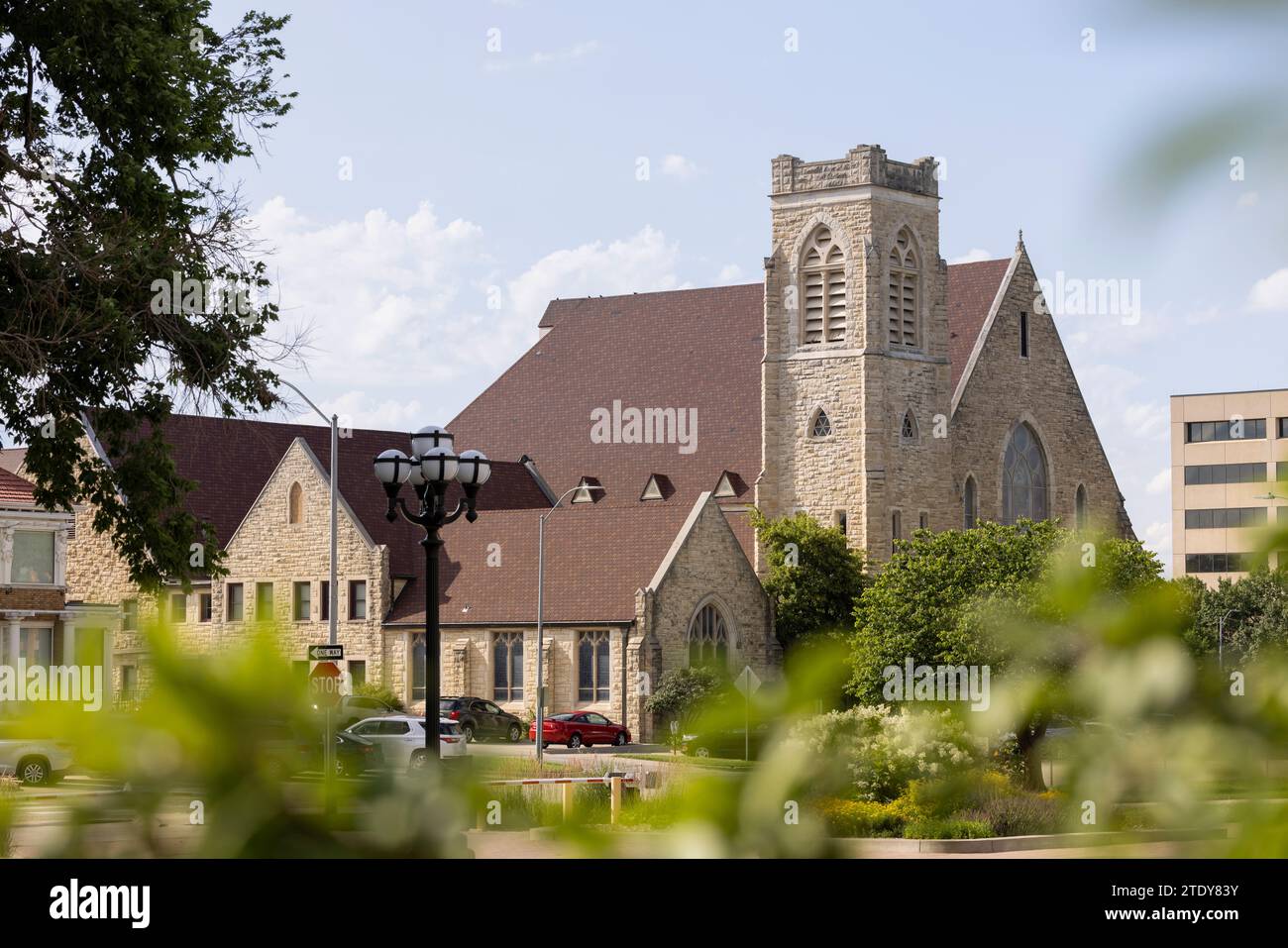 View of a historic church and buildings in downtown Topeka, Kansas, USA ...