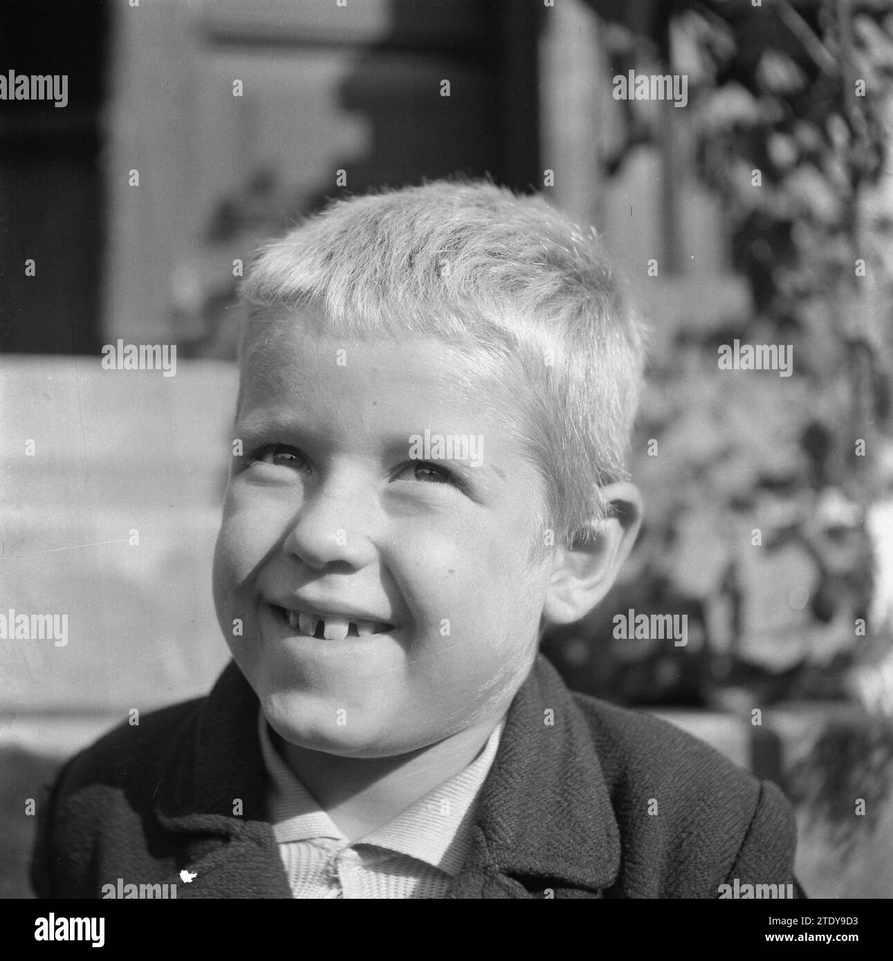 Close up of a young boy looking left ca. October 1945 Stock Photo - Alamy
