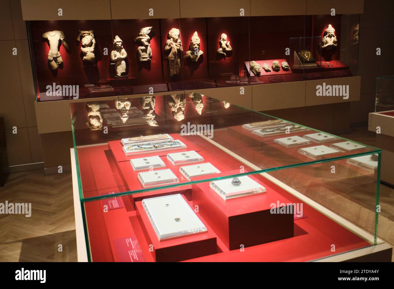 A gallery displaying ancient archeological artifacts and religious ...