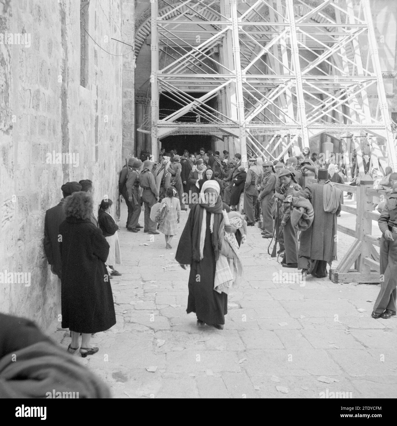 Easter celebration. Believers at the scaffolding at the entrance to the ...