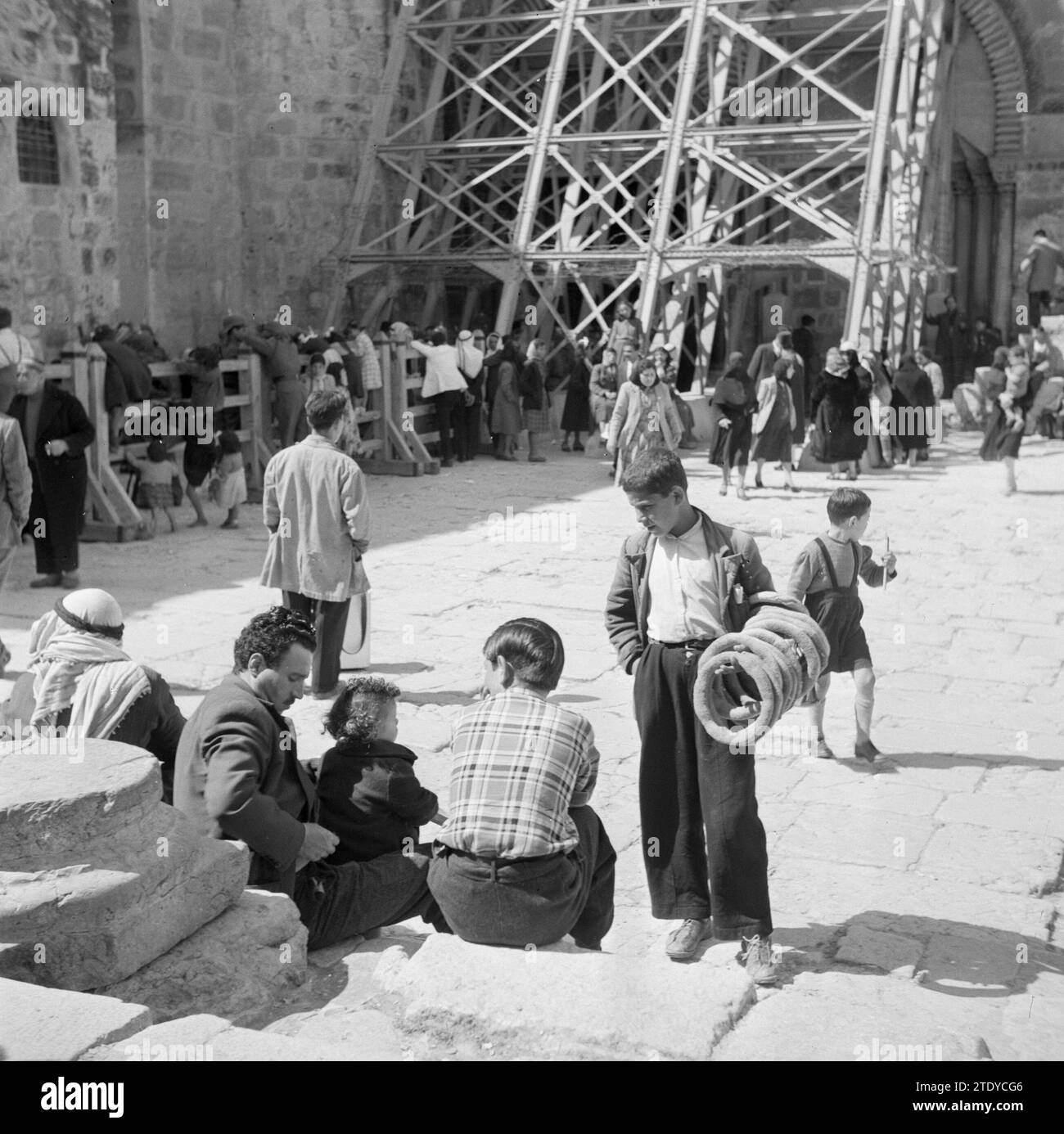 Easter celebration. Believers at the scaffolding at the entrance to the ...