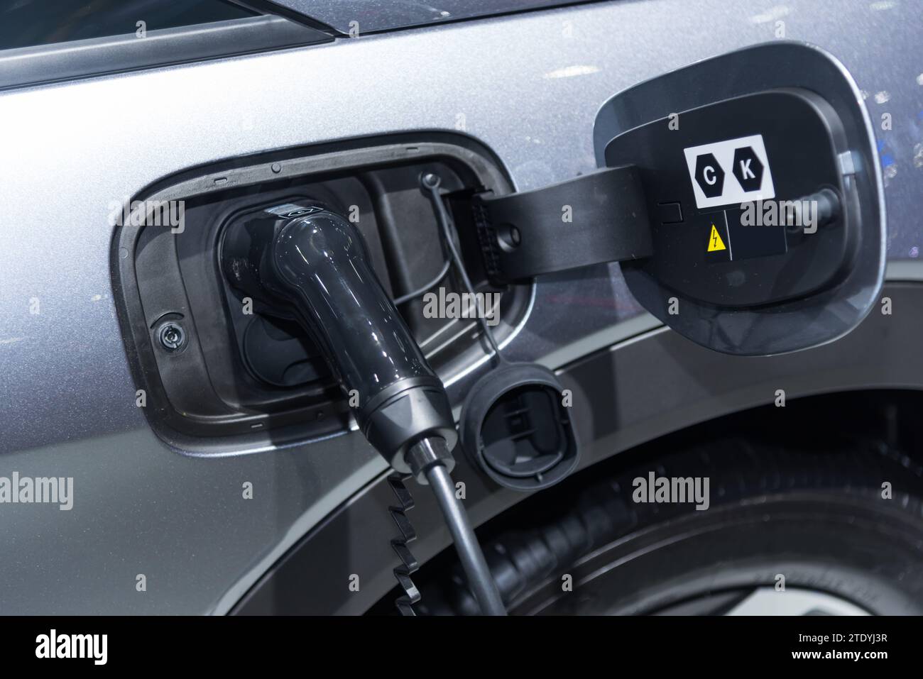 Connect the EV plug for charging the EV car Stock Photo - Alamy