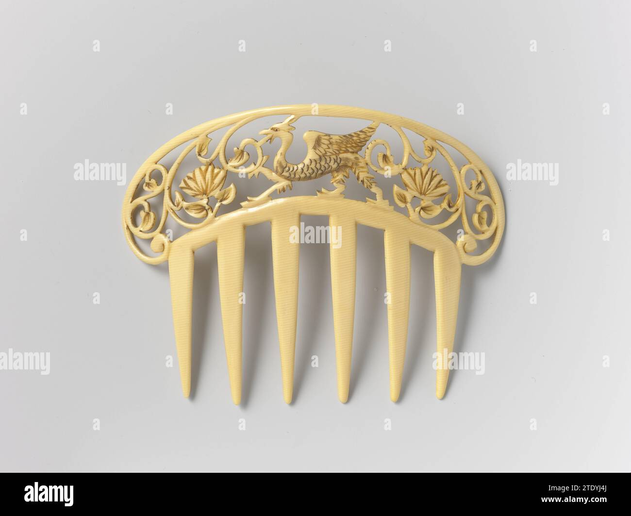 Galalith's hair comb with a half round back with an ajour sliced dragon ...