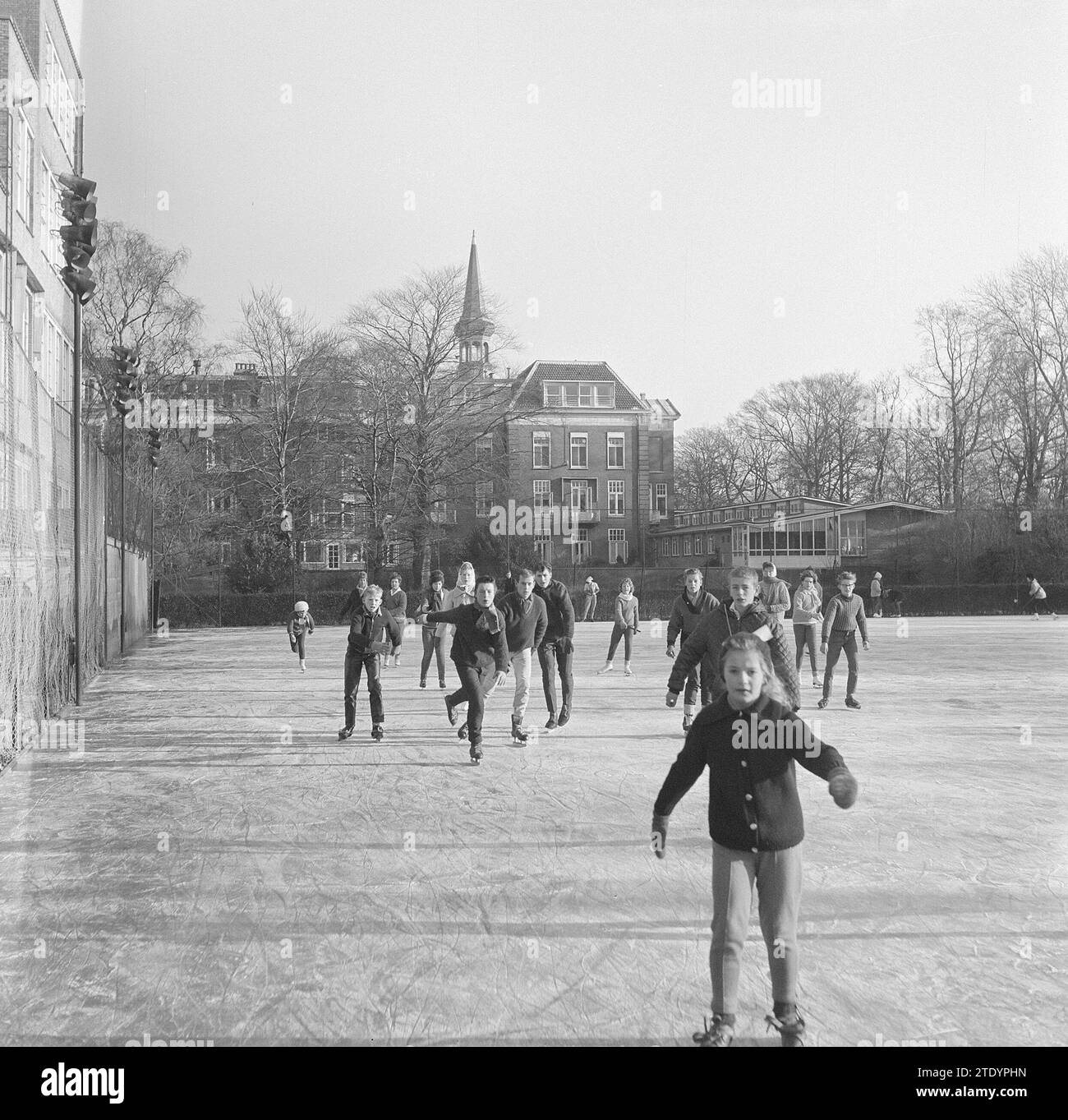 Skating on tennis courts at the Kattenlaan in Amsterdam ca. December 23 ...