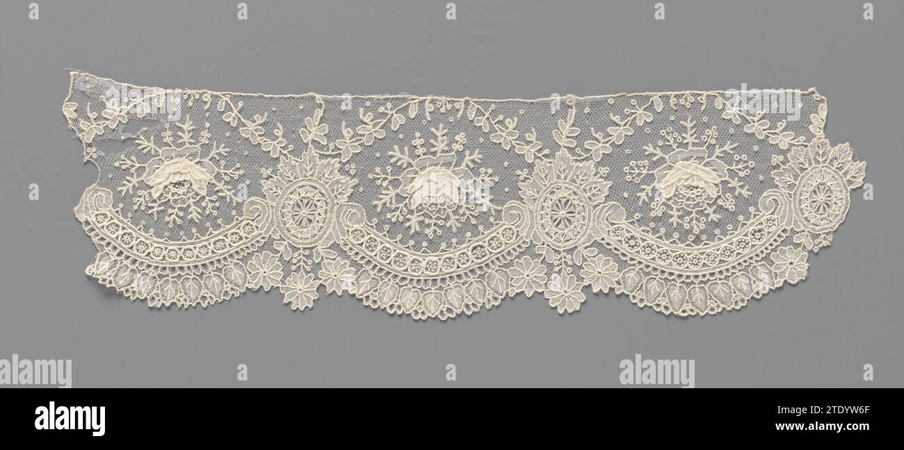 Strip of needle side with hanging hearts under horizontal C-volute with ...