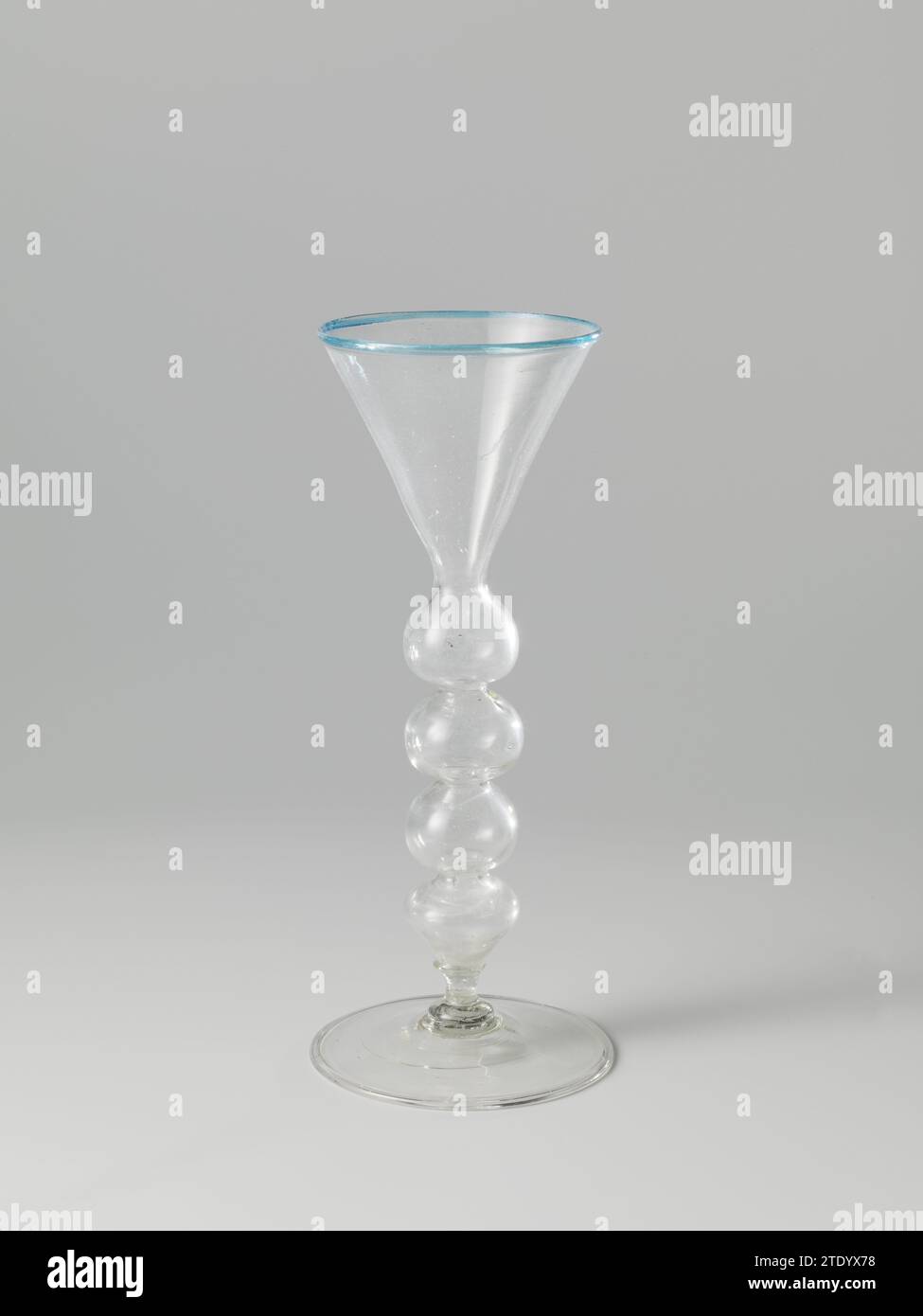 Chalice glass with a hollow trunk with baluster and three balls ...