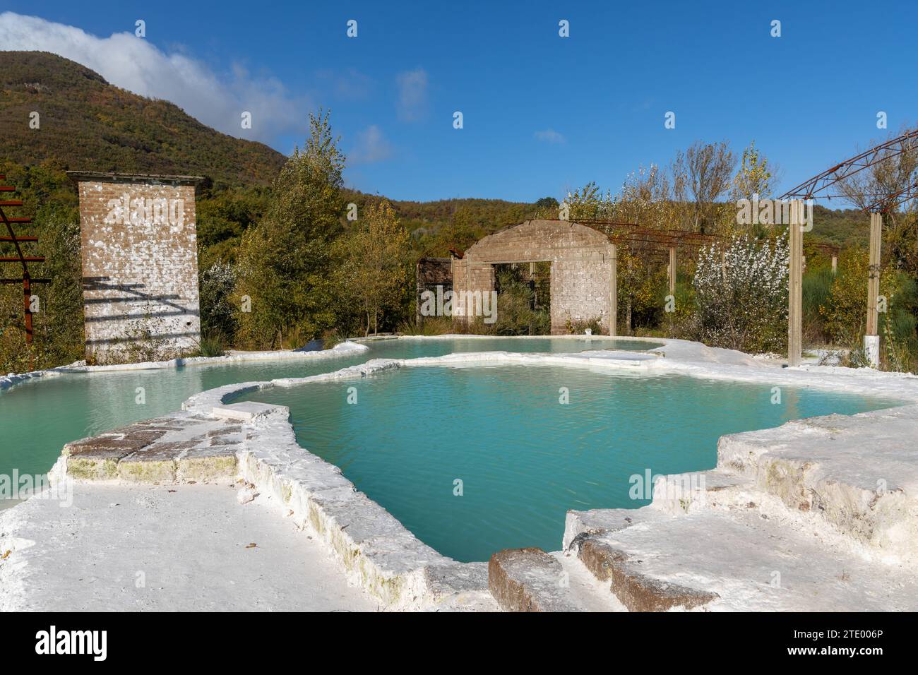 scenic turquoise hot spring pools in white gypsum baths in Bagni San ...