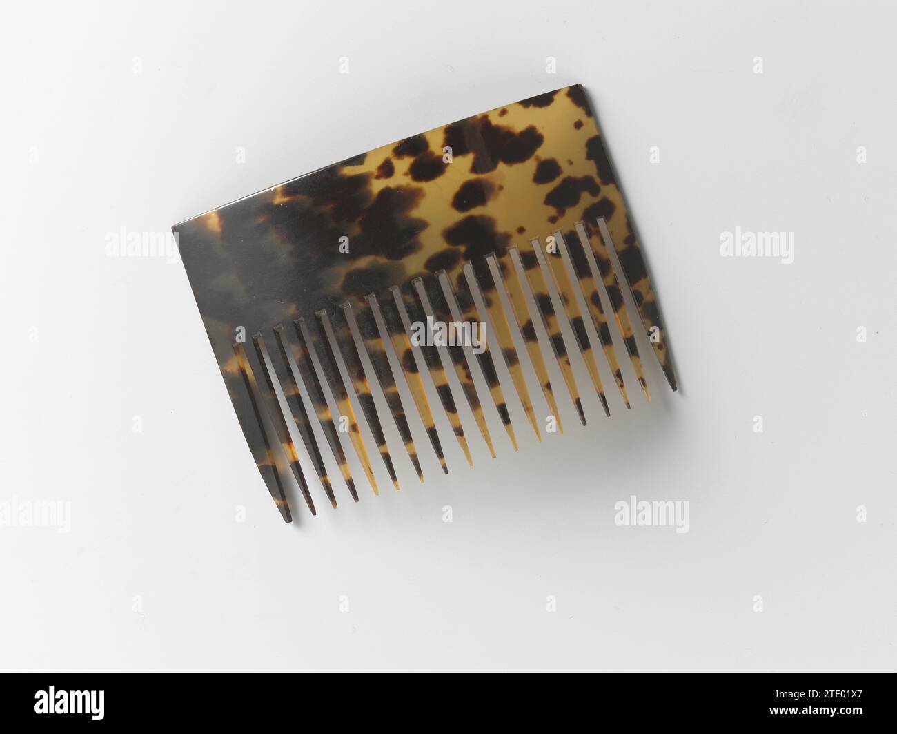 Hair comb made of turtle with unadorned rectangular smooth back ...