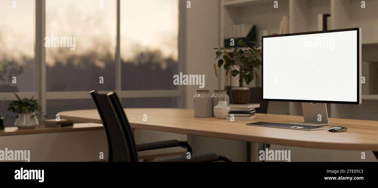 Side view image of a modern private office with a white-screen computer ...
