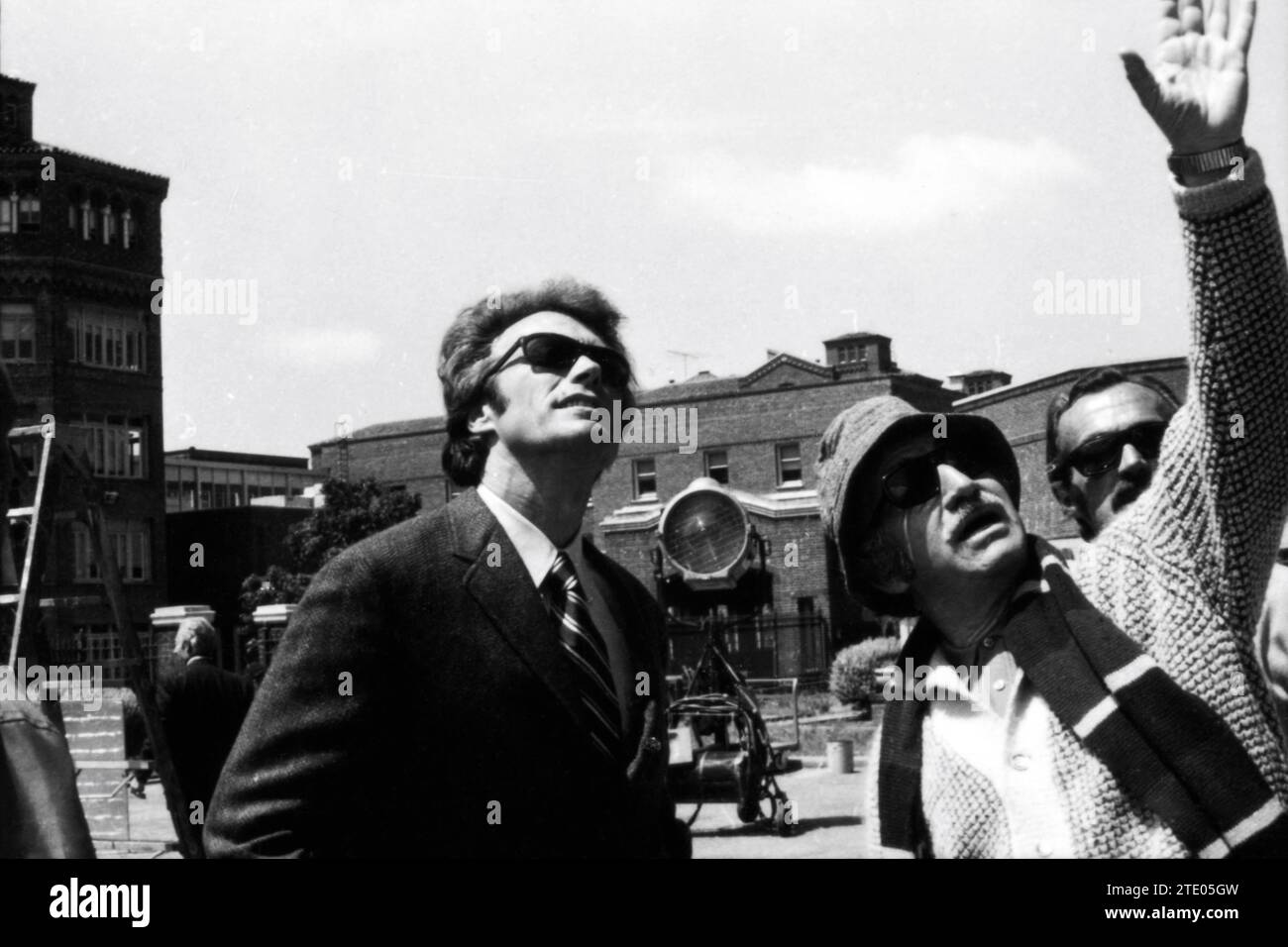 CLINT EASTWOOD and Director DON SIEGEL on set location candid photo in ...