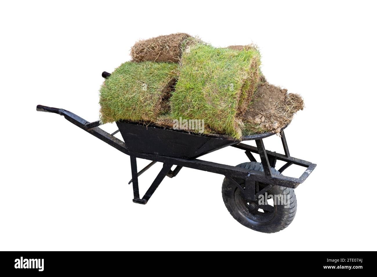 Hand pushcart full with grass for lawn on white isolated background ...