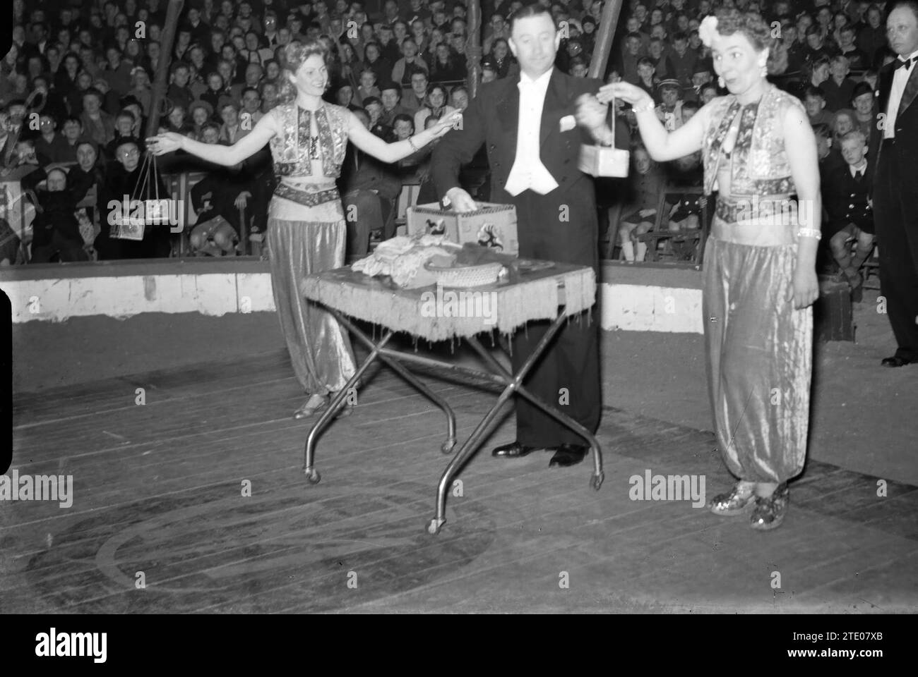 Circus Magician with assistants, late 40s, early 50s, Whizgle News from ...