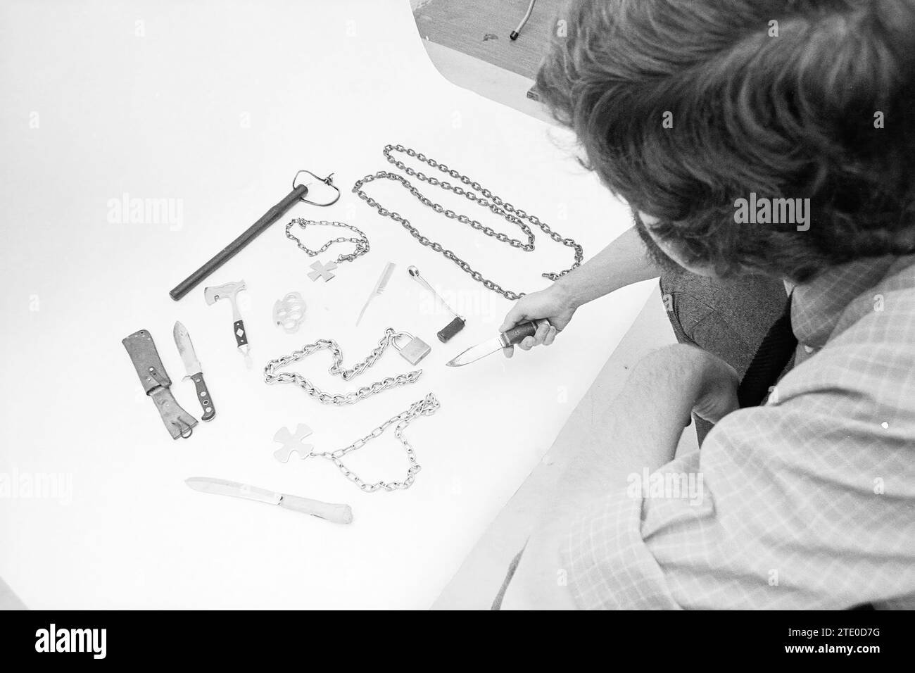 Police loot: stabbing weapons, chains, axe, 00-08-1972, Whizgle News ...