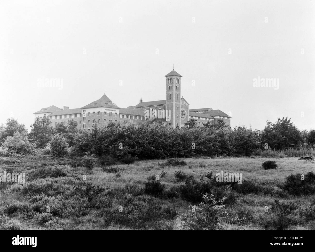 Exterior of the monastery complex: monastic buildings, church with ...