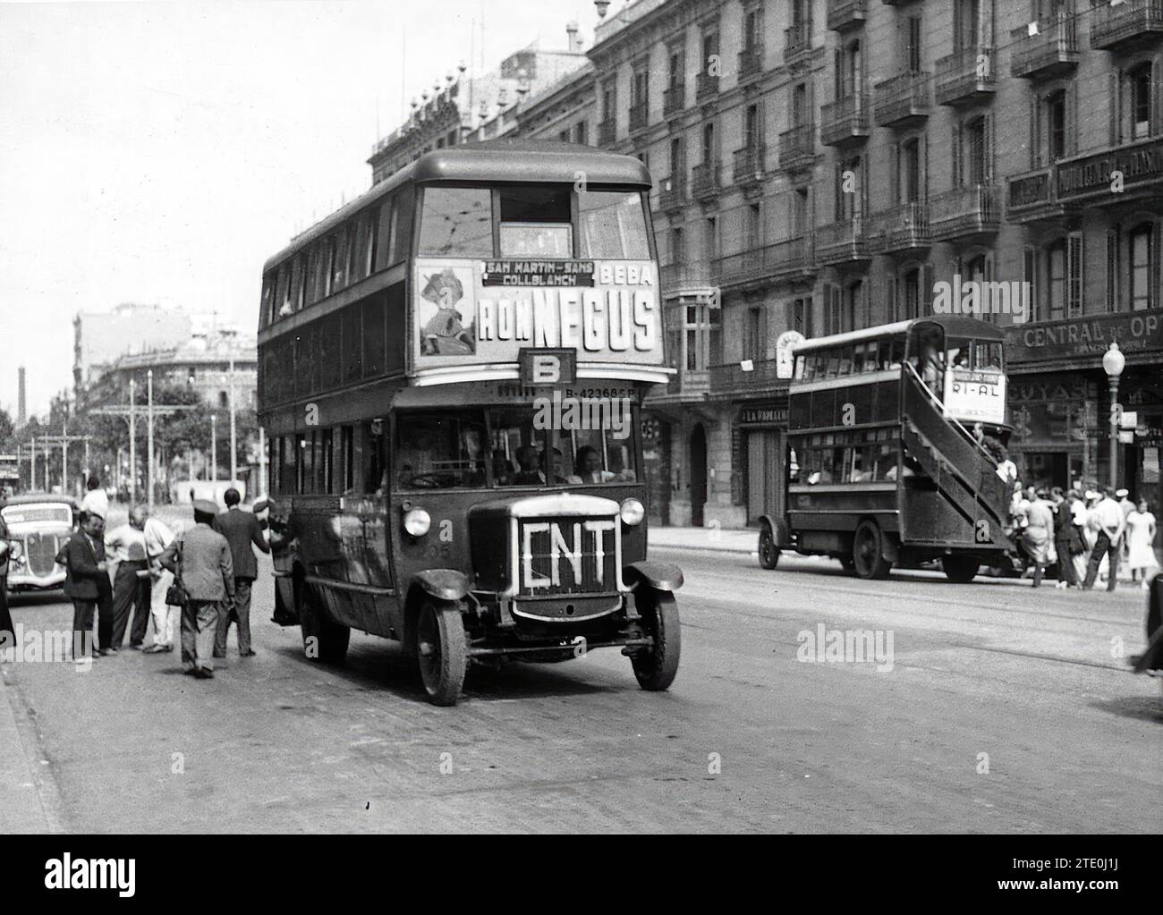 09/30/1936. A bus with the initials of the CNT runs through the streets ...