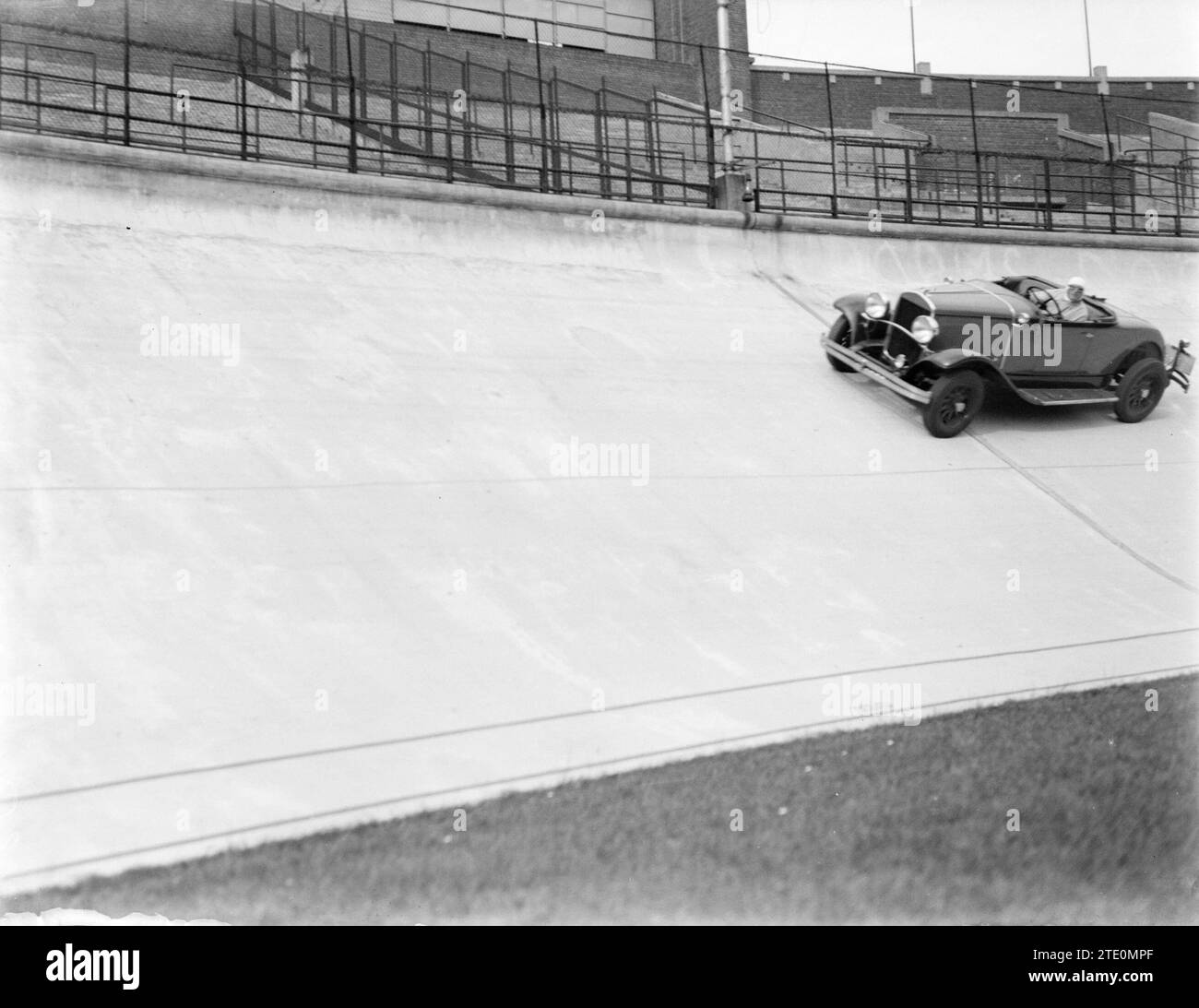 Race car driver C. van Bennekom drives a Chrysler Convertible on the ...