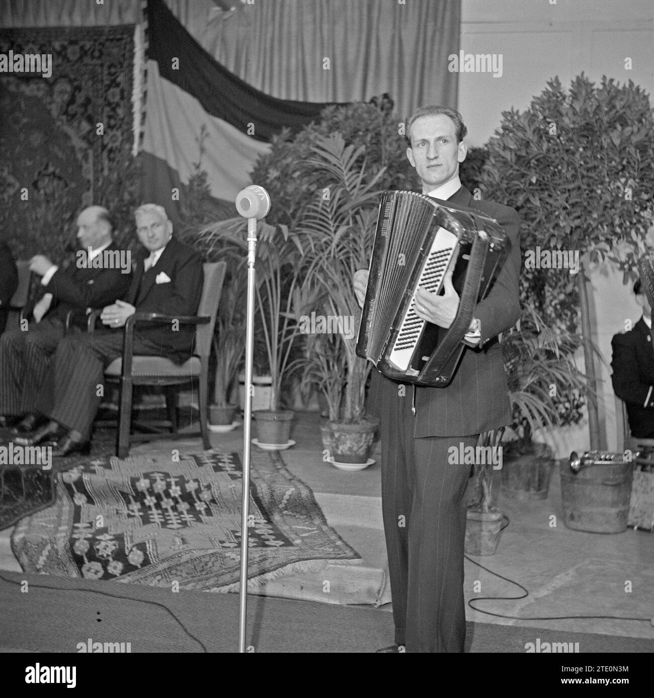Accordionist during performance ca. 1950 Stock Photo - Alamy