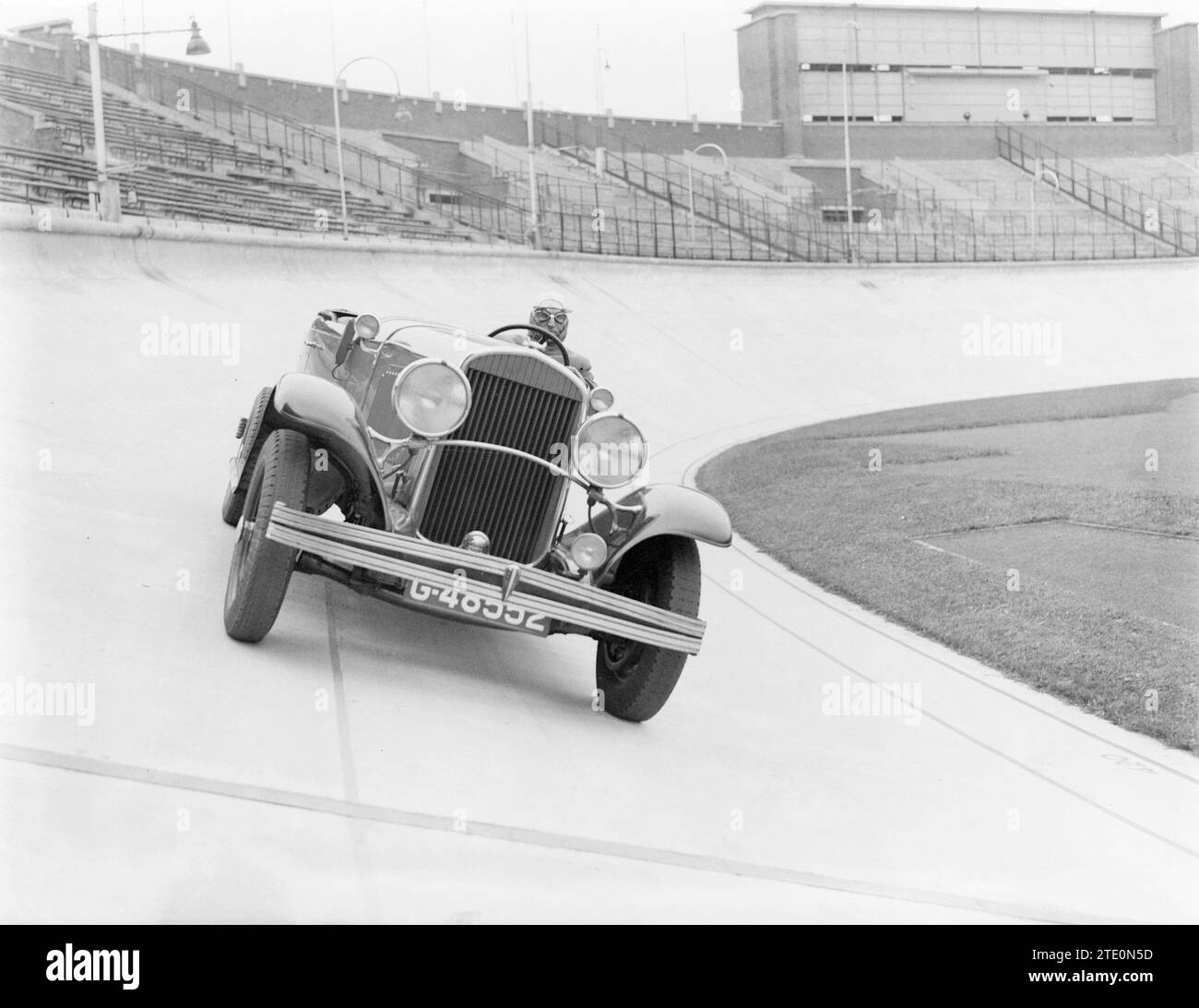 Racing driver Van Vueren standing still in his Chrysler on the ...