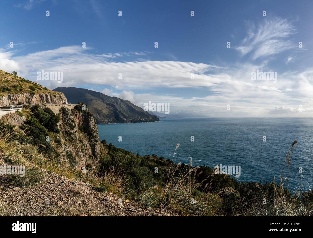 A landscape view of the Costa di Maratea with a narrow and winding ...