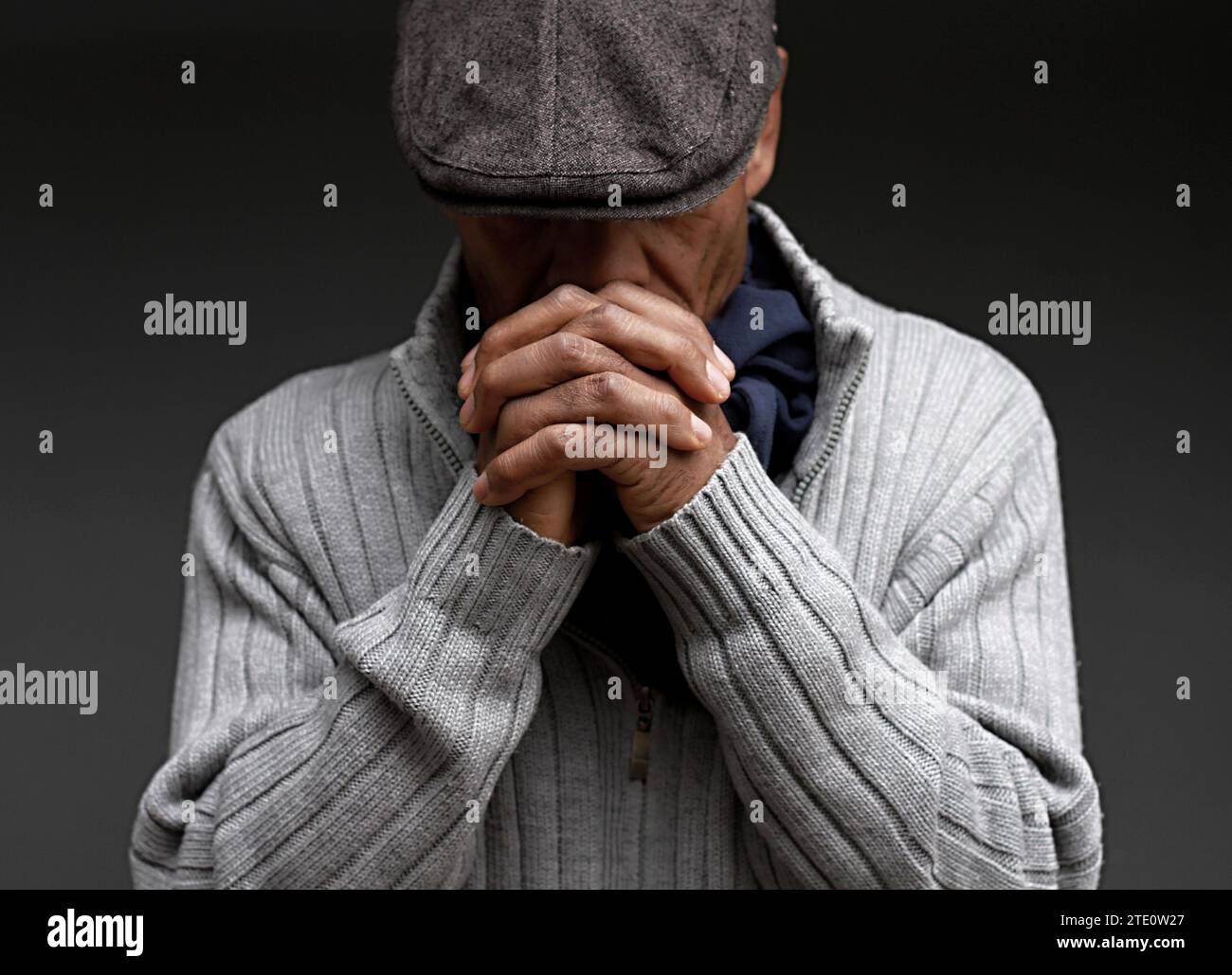 African american male praying hi-res stock photography and images - Alamy