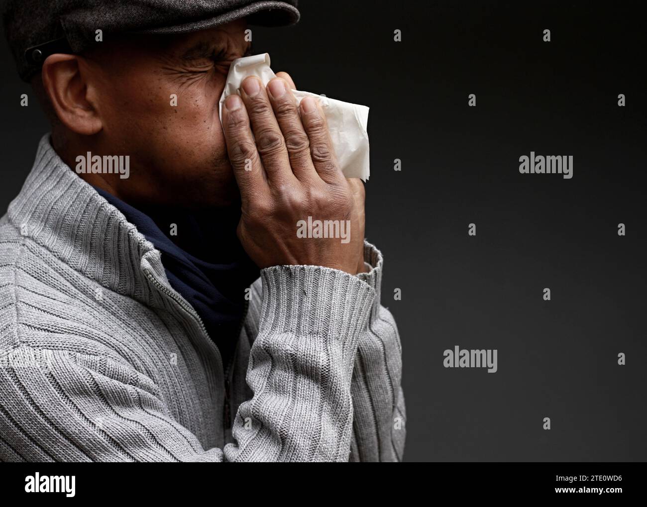 man catching the cold and flu man blowing nose after catching a cold ...