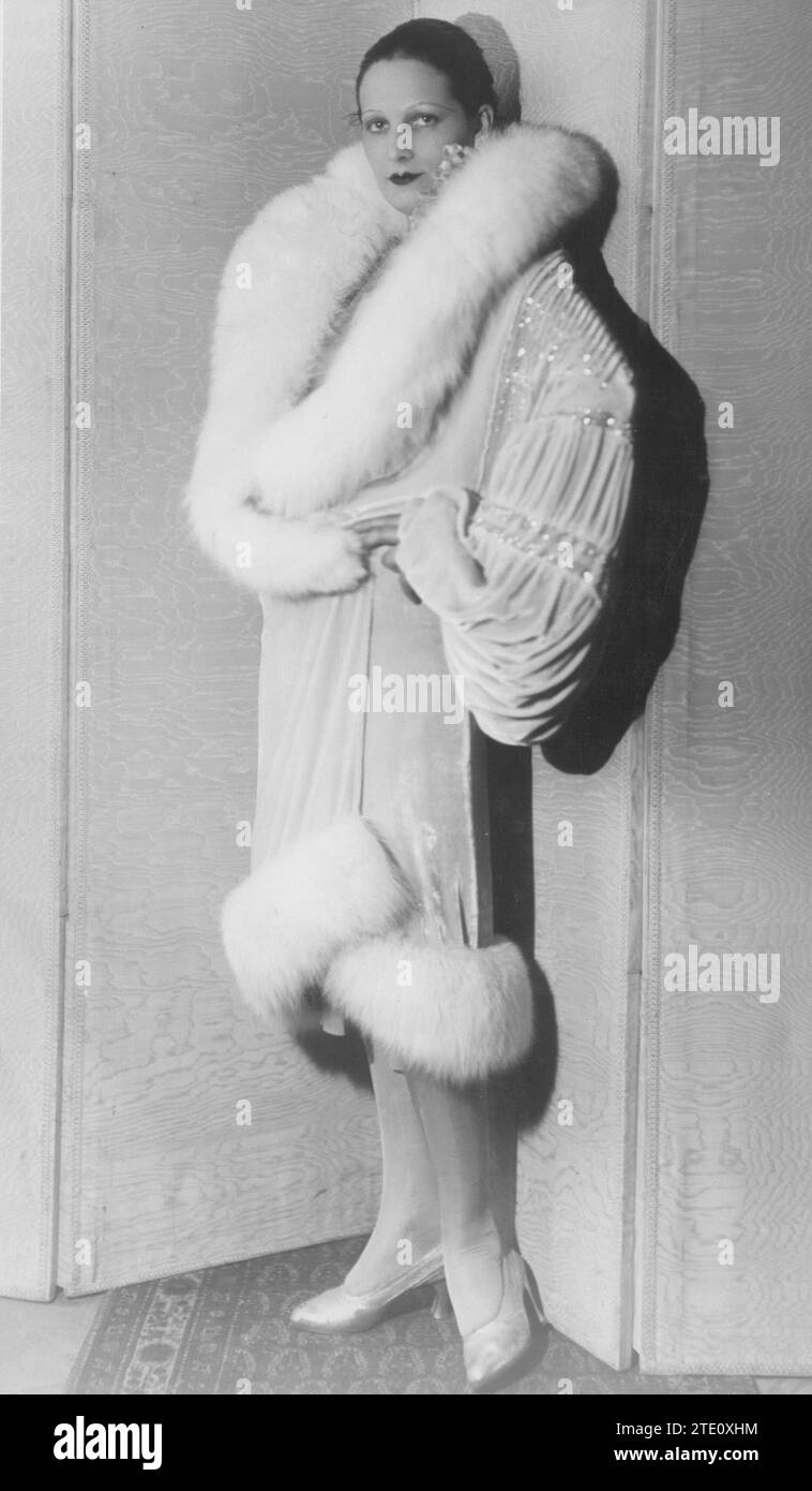 Pictured is a coat from 1929. Silver gray velvet coat, with white ...