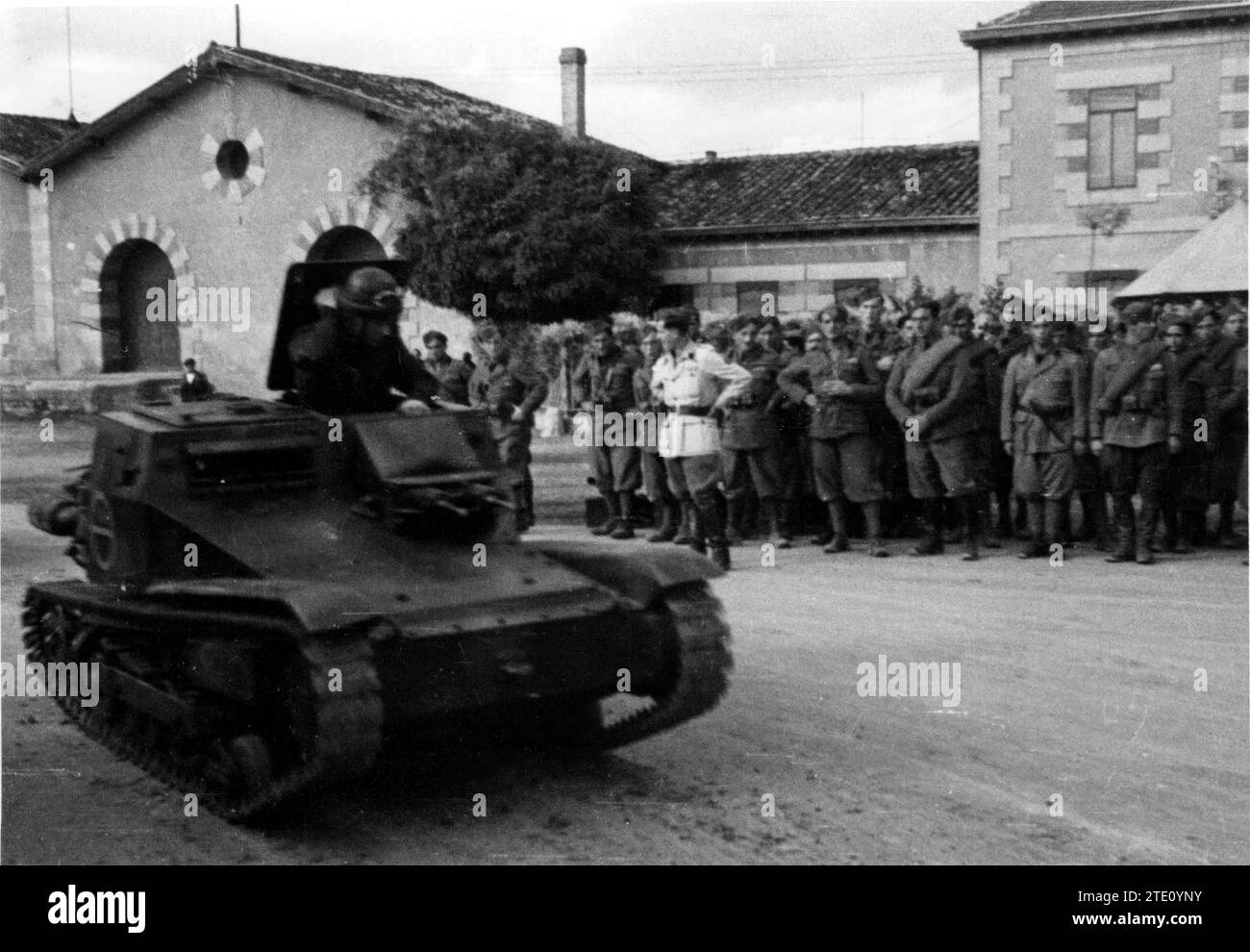 1937 (CA.). Spanish Civil War. National Army tanks passing in front of ...