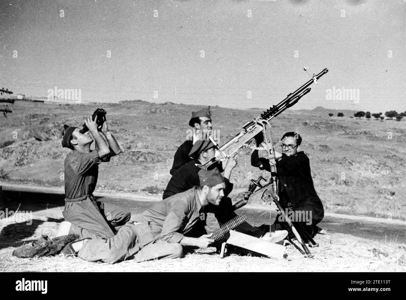 07/31/1936. An anti-aircraft machine gun chasing away a plane, on the ...