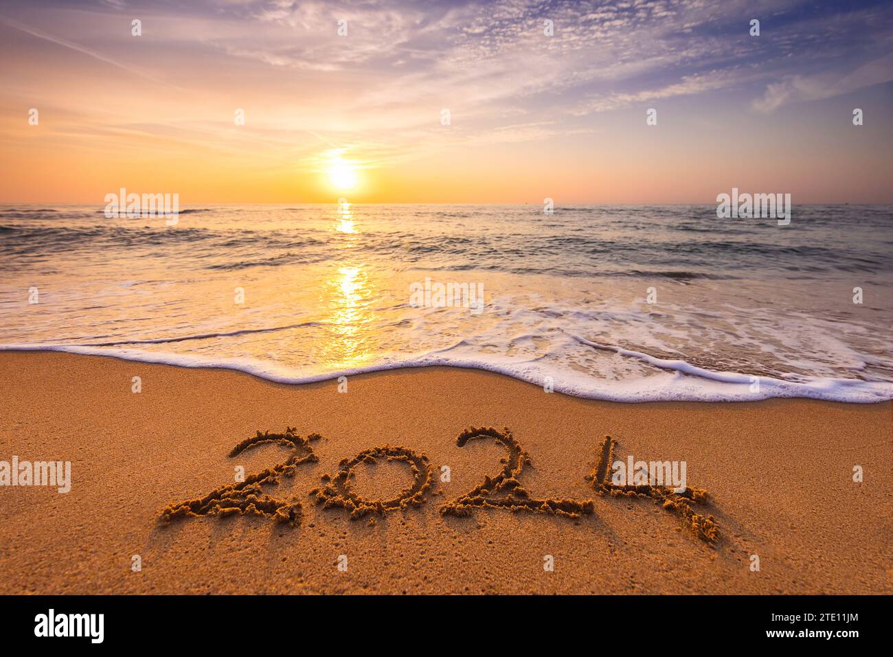 Happy New Year 2024 concept, lettering on the beach. Written text on ...