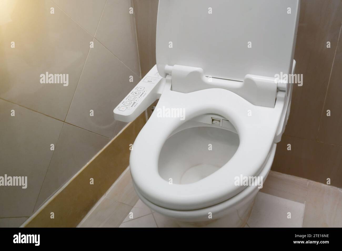 High Tech toilet with automatic bidet installed in public restroom ...