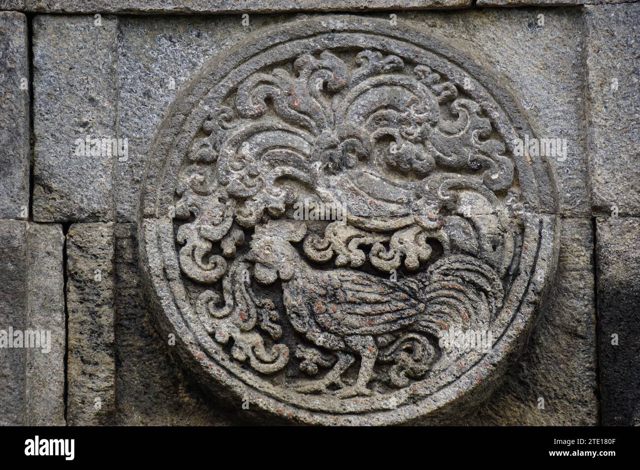 medallion in the penataran temple with animal reliefs Stock Photo - Alamy