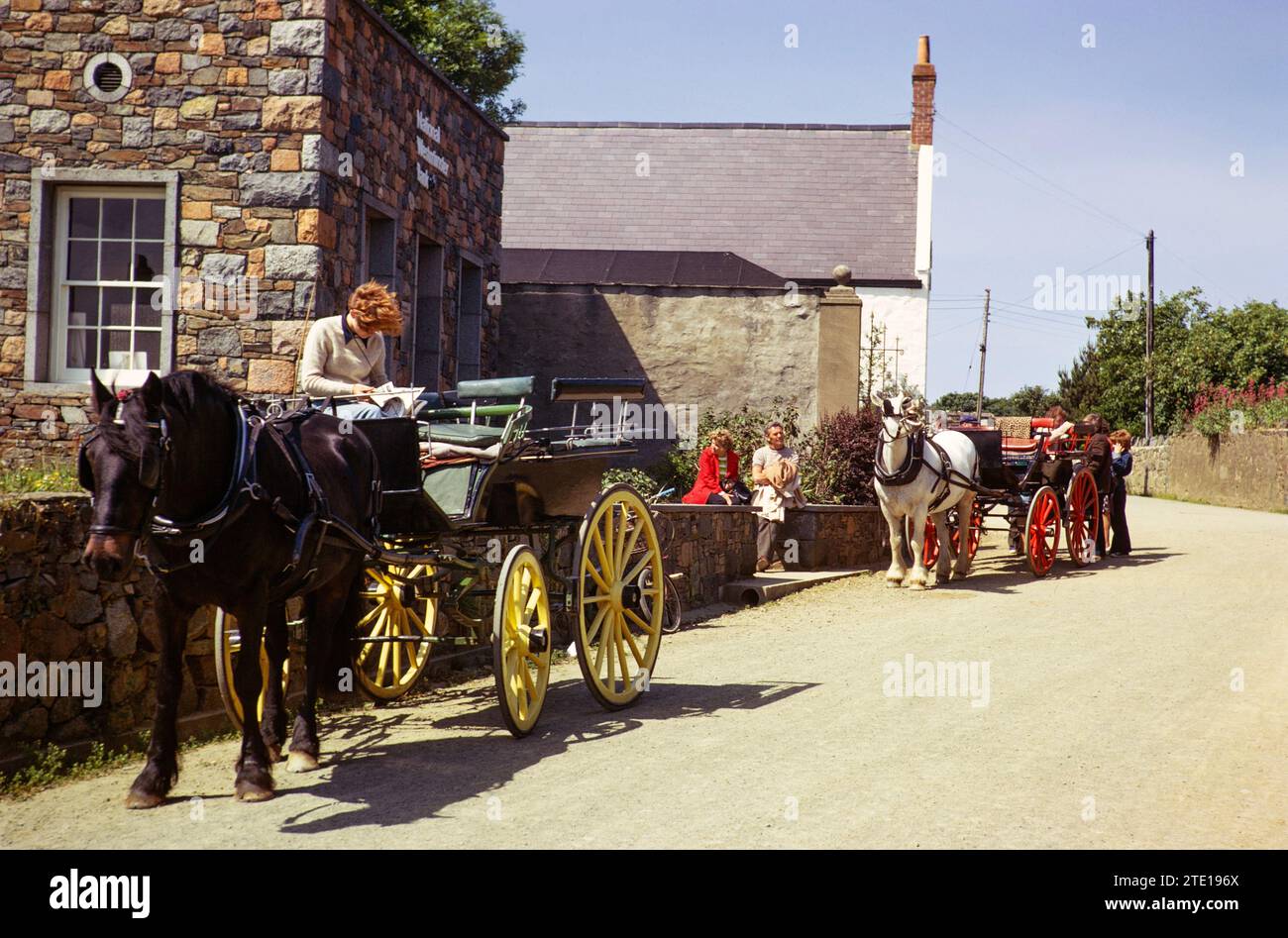 Horsedrawn carriages outside National Westminster bank branch, Sark ...