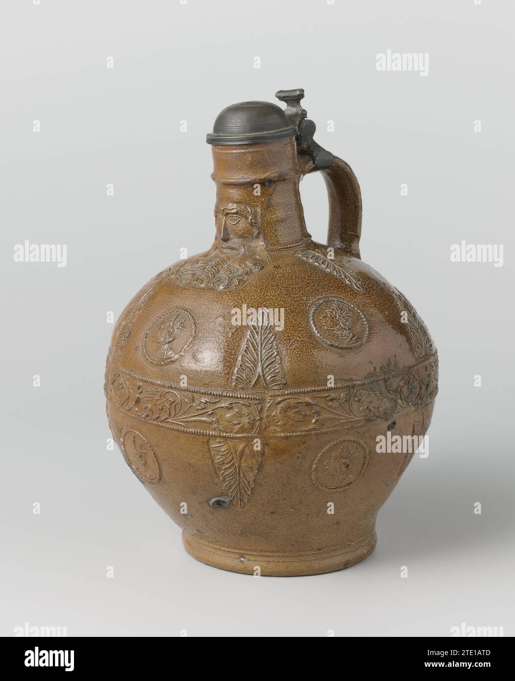 Jug (Bartmann jug) with portraits, leaves and an ornamental border ...