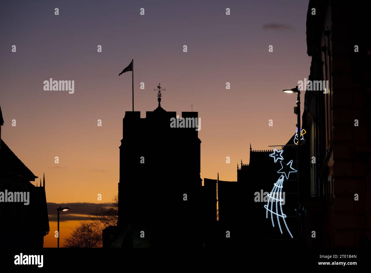 Westgate chapel at sunset and Christmas lights, Warwick, Warwickshire ...