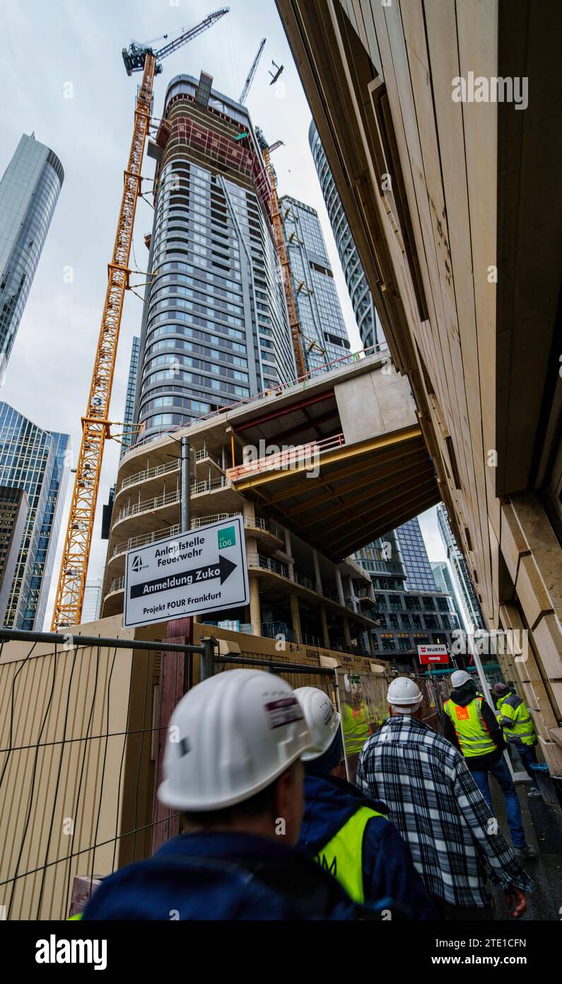 FILED - 11 December 2023, Hesse, Frankfurt/Main: Construction workers ...