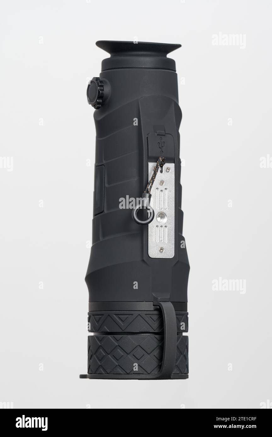 Long-range monocular isolated on a white background, rubber body with a ...